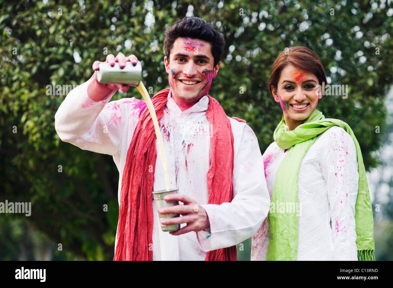 Couple celebrating Holi Stock Photo - Alamy