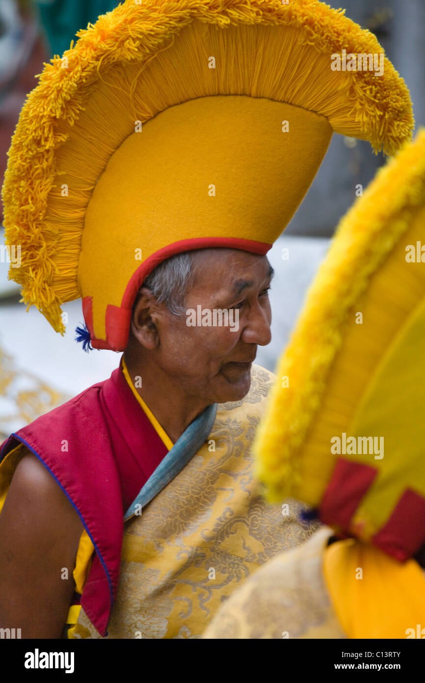 Yellow Hat Lama blowing trumpet at Ladakh Festival, Leh, Ladakh, India ...