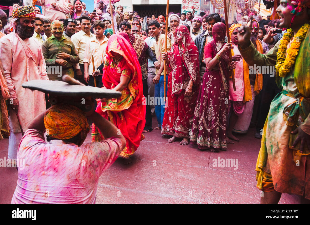 People celebrating 'Lath Maar Holi' festival, Barsana, Uttar Pradesh ...