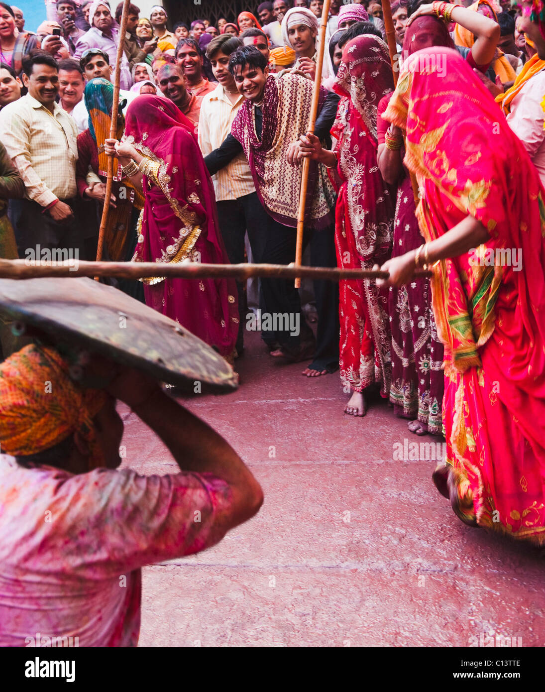 People celebrating 'Lath Maar Holi' festival, Barsana, Uttar Pradesh ...