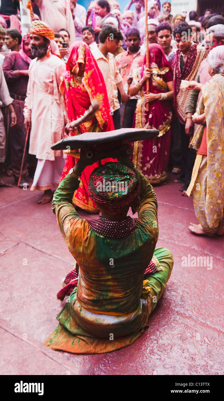 People celebrating lath maar holi hi-res stock photography and images ...