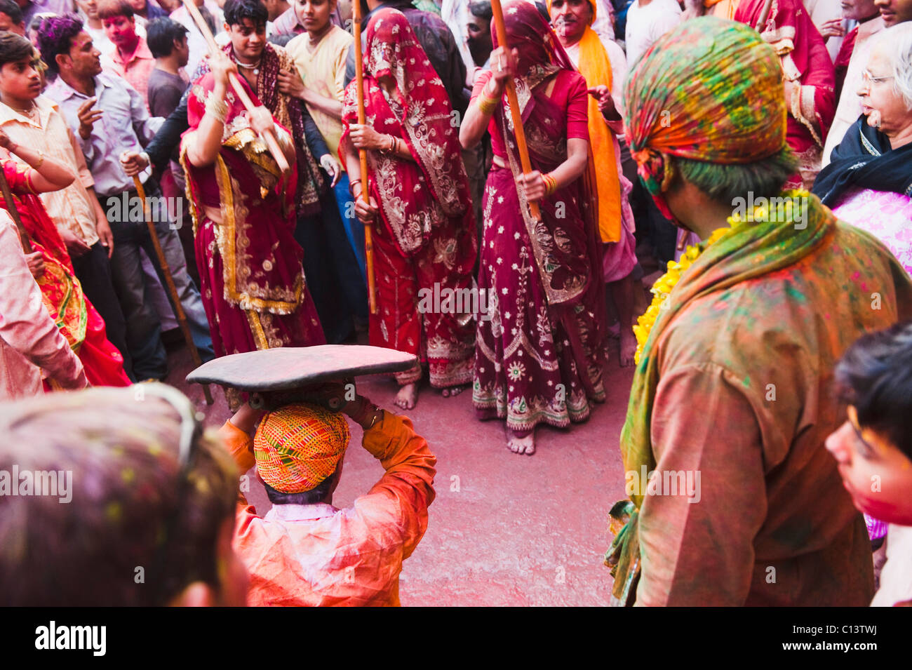 People celebrating 'Lath Maar Holi' festival, Barsana, Uttar Pradesh ...