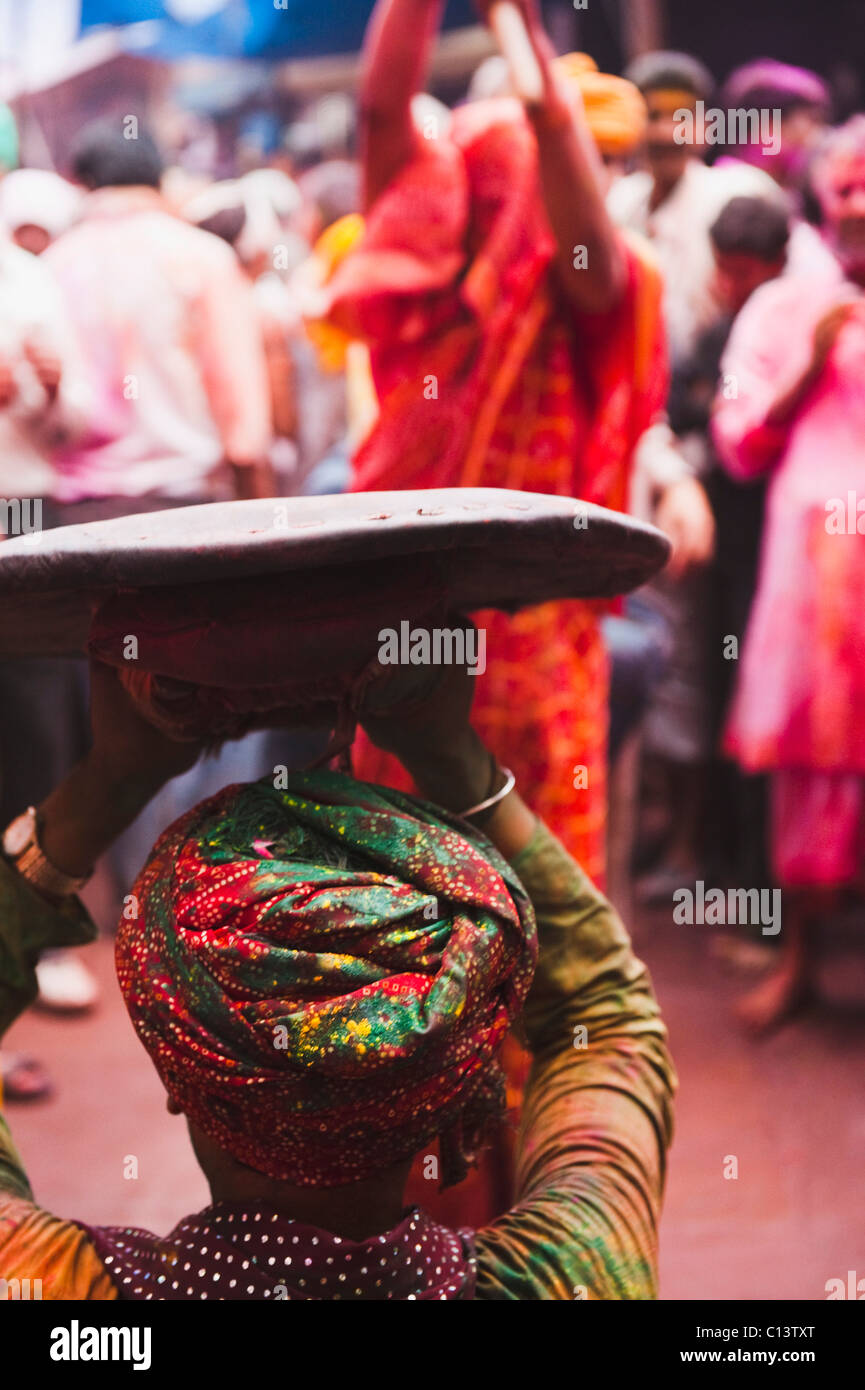 People celebrating 'Lath Maar Holi' festival, Barsana, Uttar Pradesh ...