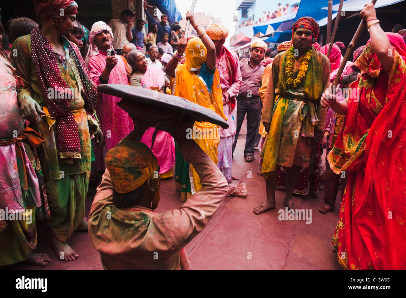 People celebrating 'Lath Maar Holi' festival, Barsana, Uttar Pradesh ...