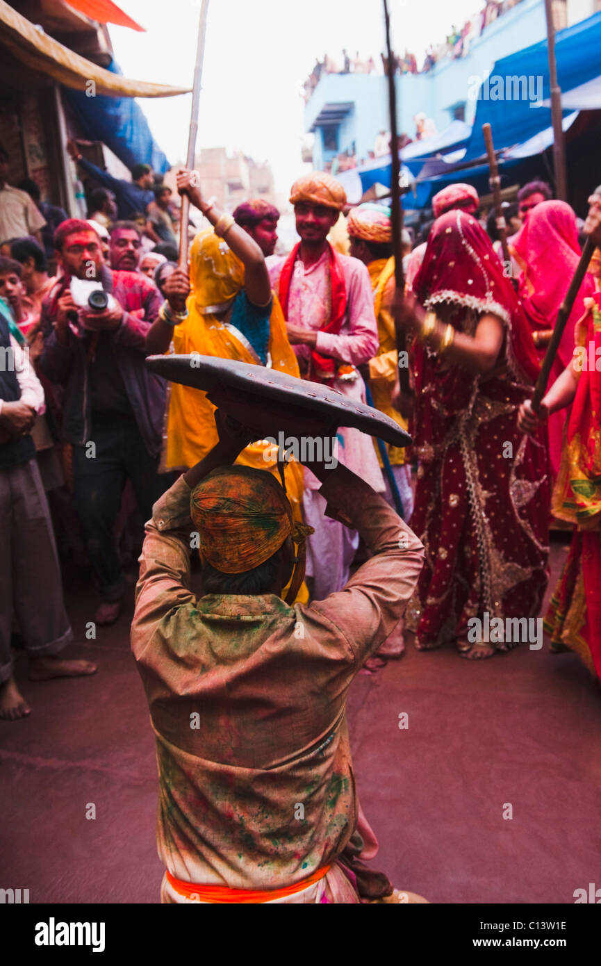 People celebrating lath maar holi hi-res stock photography and images ...