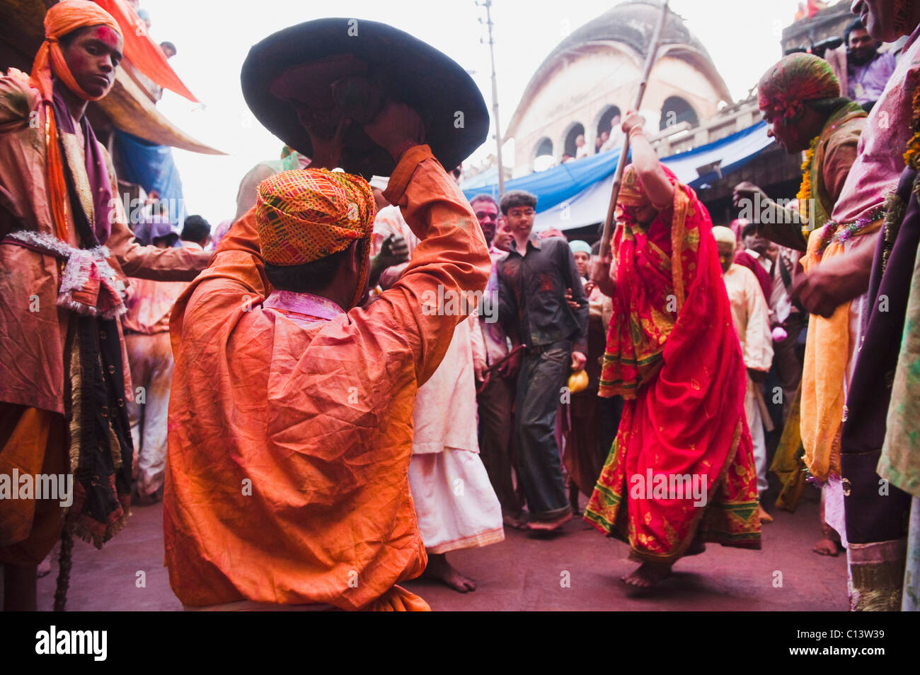 People celebrating 'Lath Maar Holi' festival, Barsana, Uttar Pradesh ...