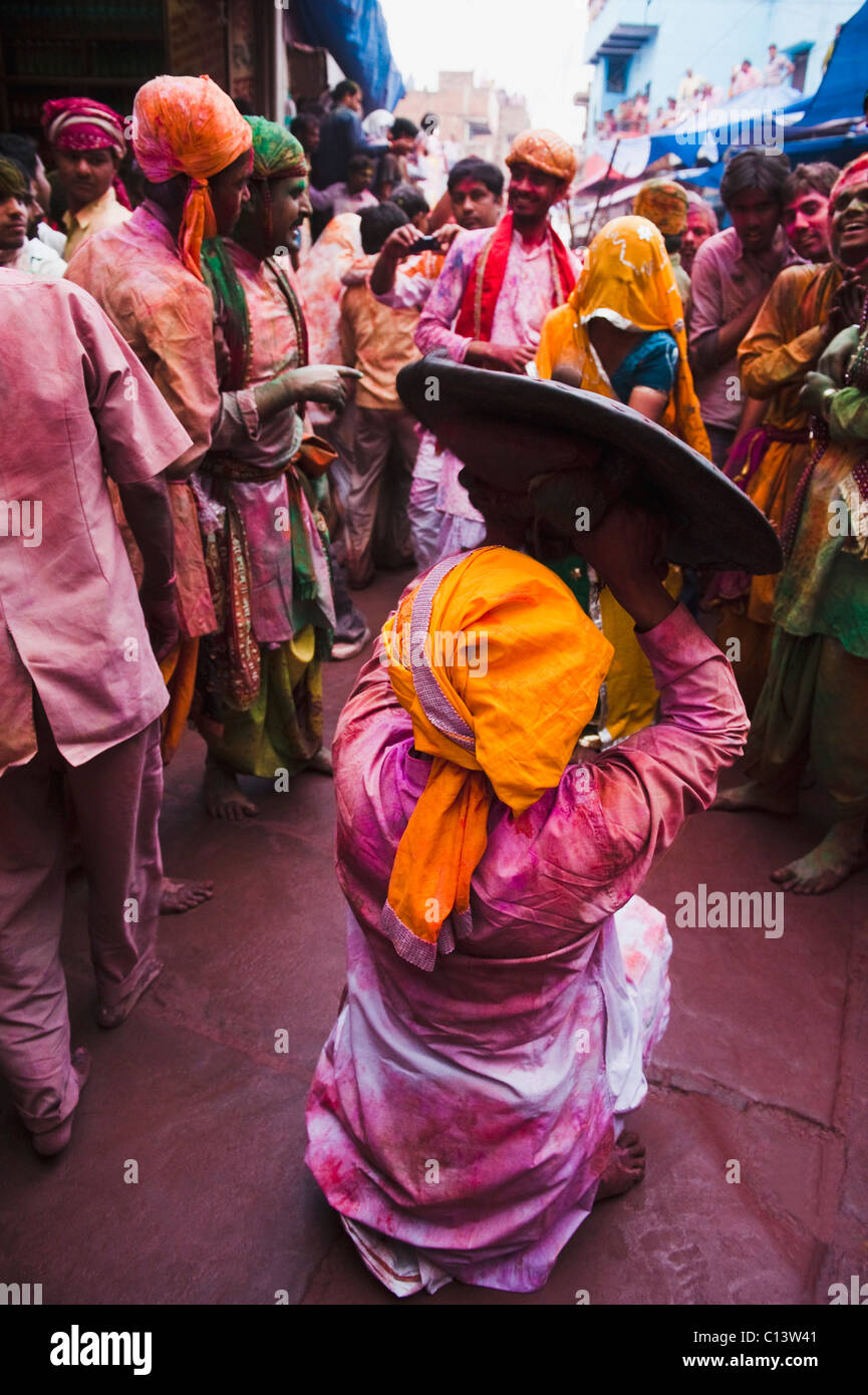 People celebrating 'Lath Maar Holi' festival, Barsana, Uttar Pradesh ...