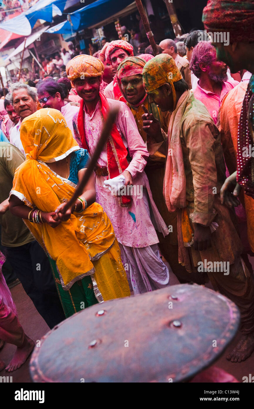 People celebrating 'Lath Maar Holi' festival, Barsana, Uttar Pradesh ...