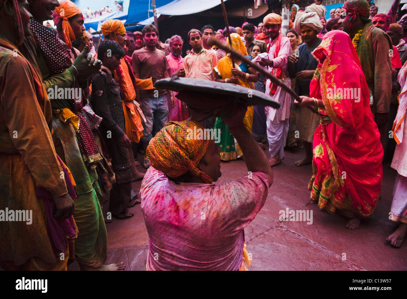 People celebrating lath maar holi hi-res stock photography and images ...