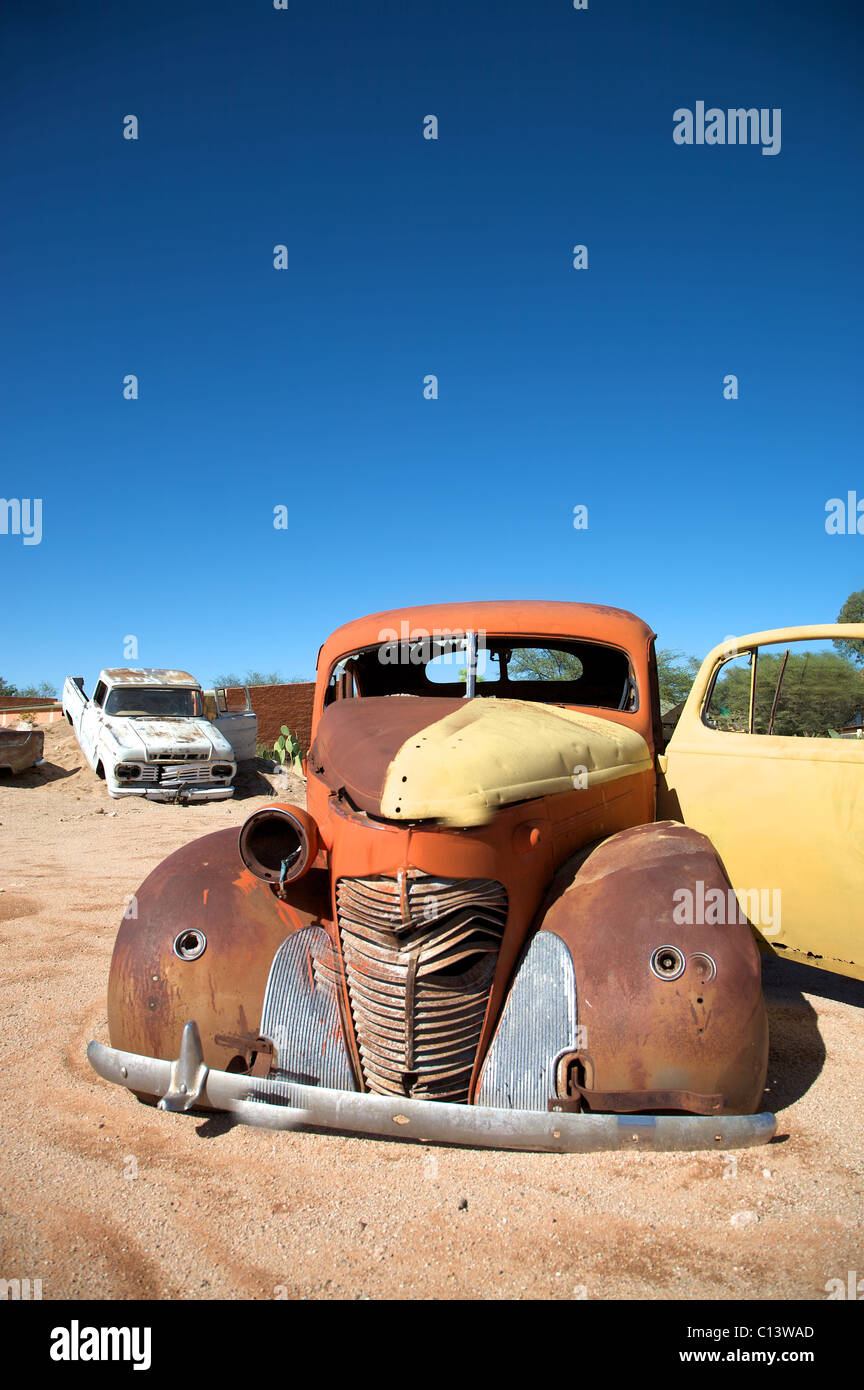 Old car on the road in Namibia with a blue sky Stock Photo - Alamy