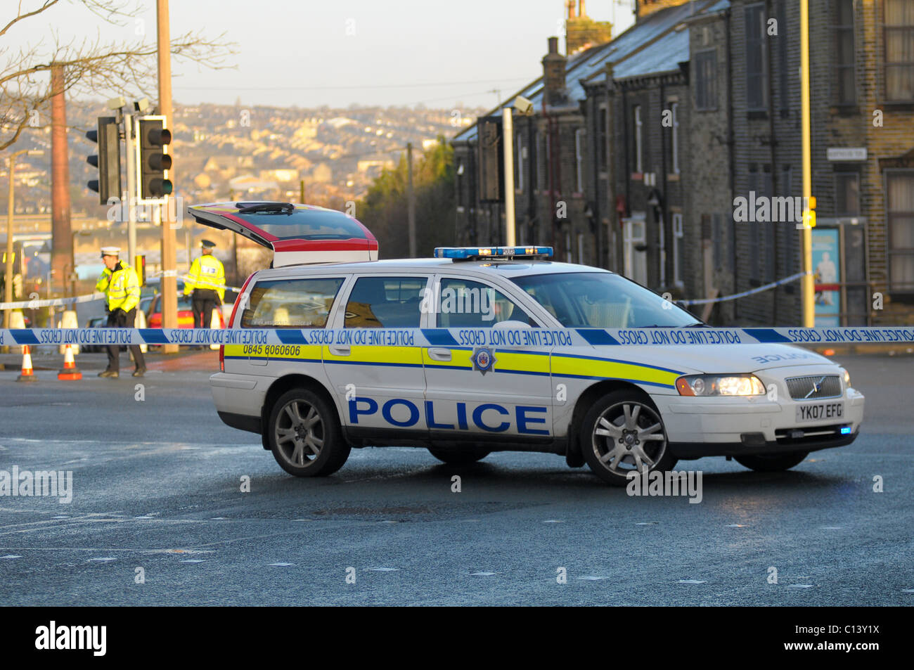 Accident Police blocking main road after accident Stock Photo - Alamy
