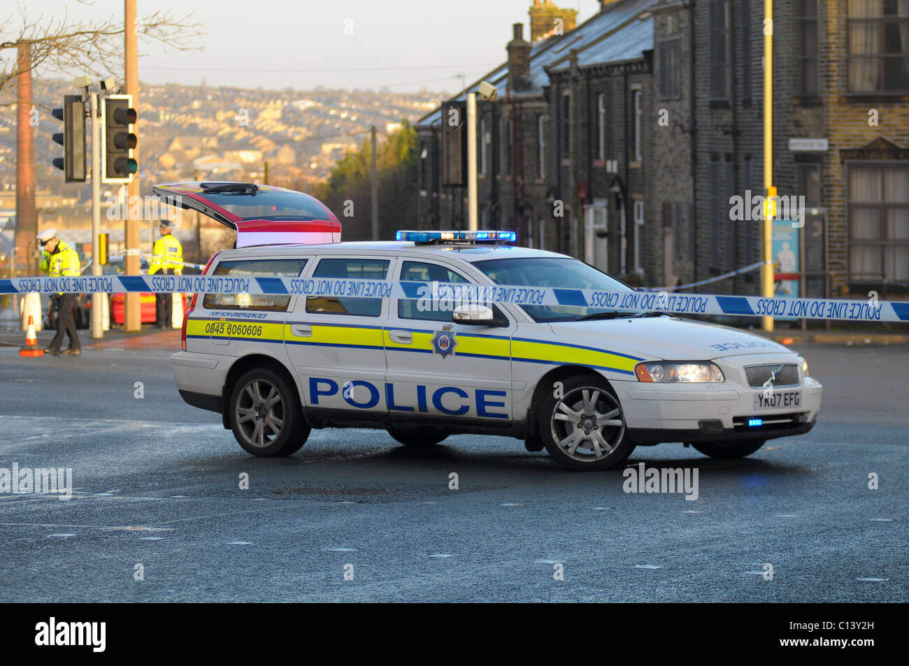 Accident Police blocking main road after accident Stock Photo - Alamy