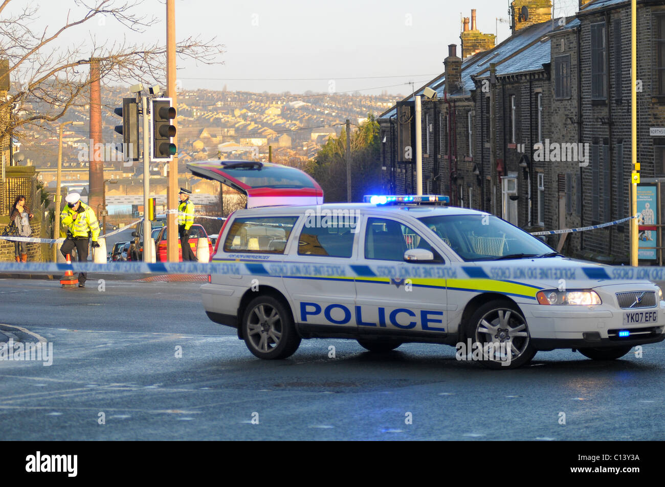 Accident Police blocking main road after accident Stock Photo - Alamy