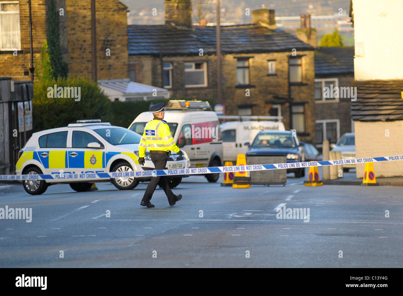 Accident Police blocking main road after accident Stock Photo - Alamy