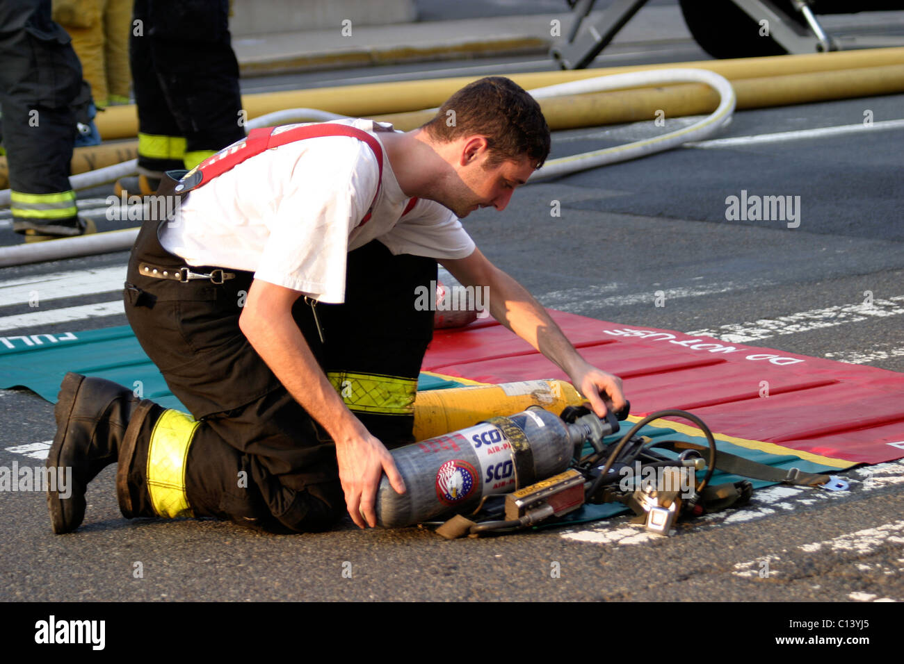 Firefighter scba ladder hi-res stock photography and images - Alamy