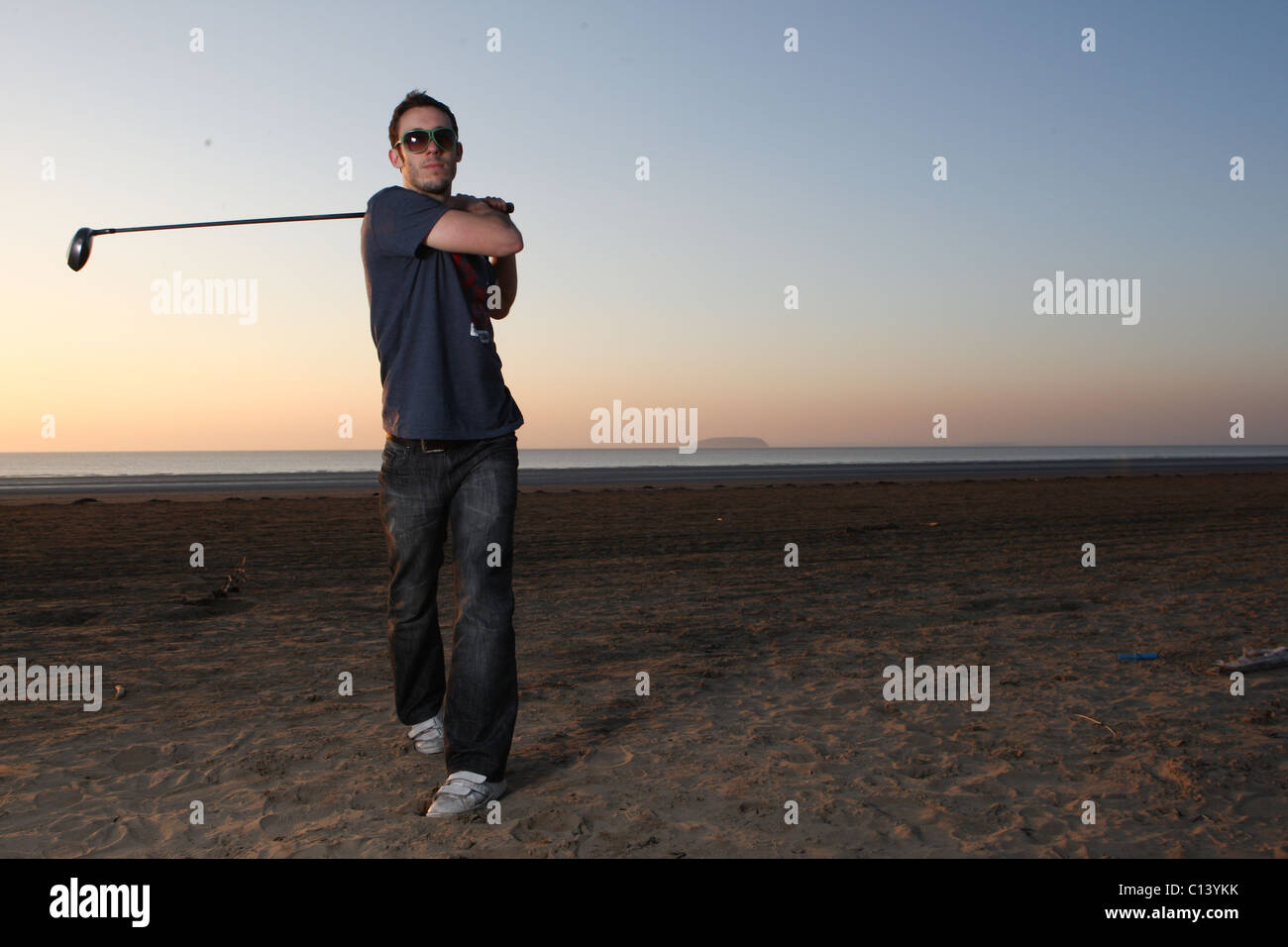 Golf on beach hi-res stock photography and images - Alamy