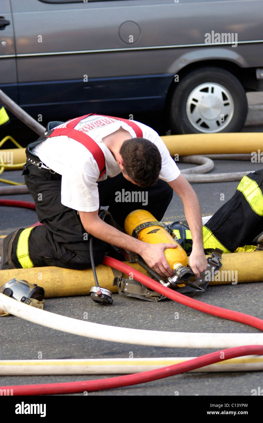 Firefighter scba ladder hi-res stock photography and images - Alamy
