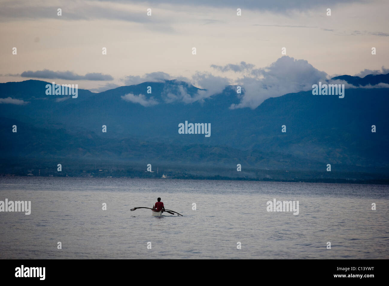 Small rowing boat in South China Sea Stock Photo - Alamy
