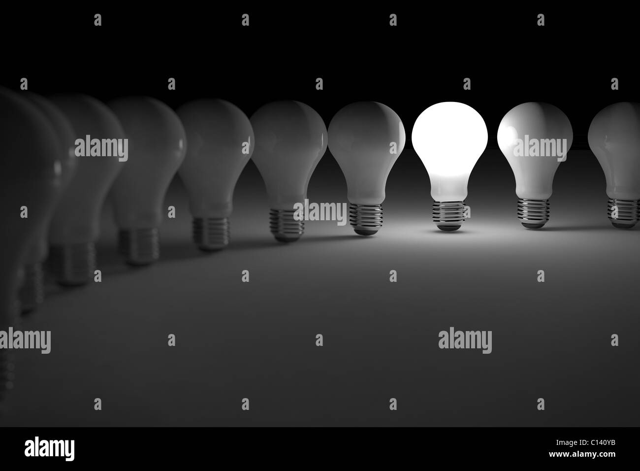 One lit light bulb Stock Photo - Alamy