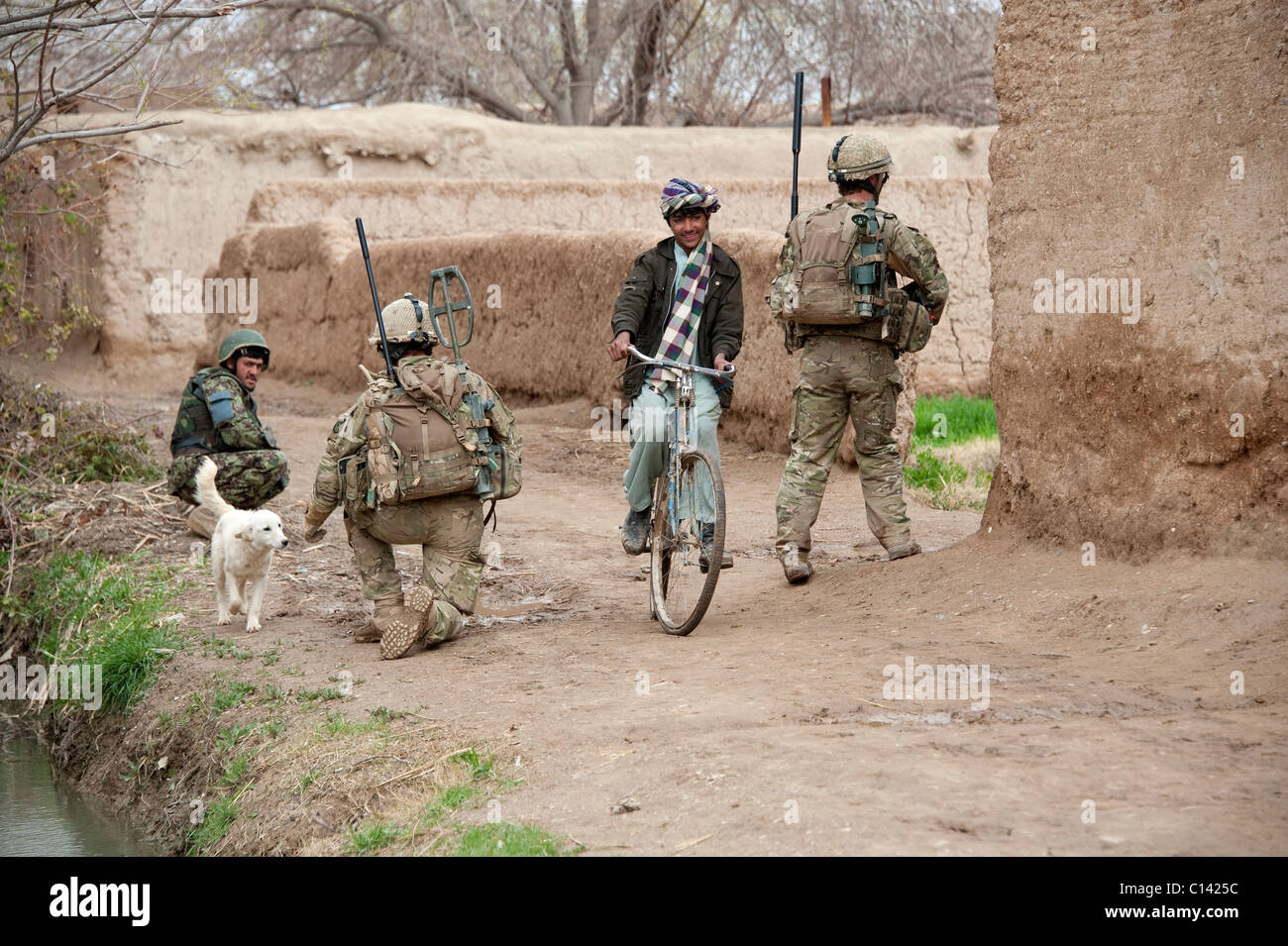 Soldiers meet Afghan people in Helmand Stock Photo - Alamy