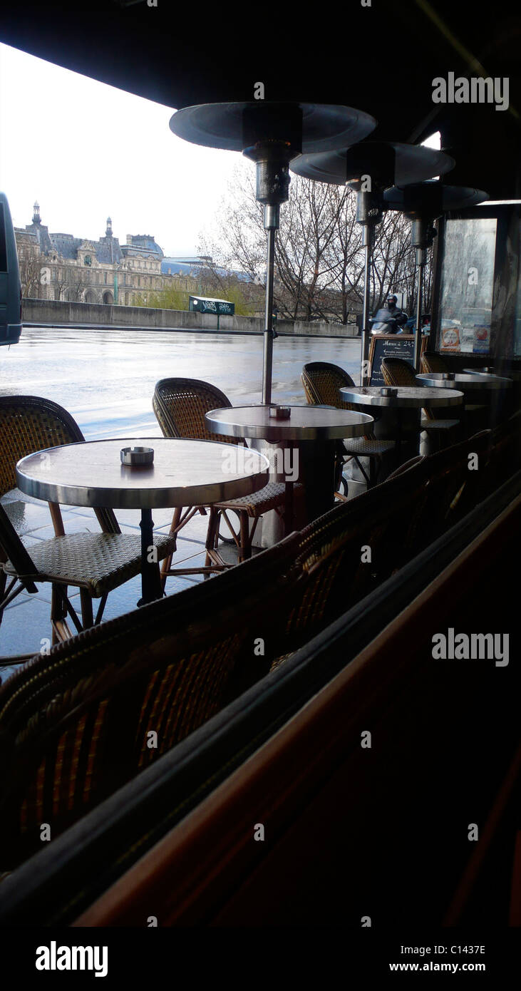 French cafe windy day Paris tables silhouettes Stock Photo - Alamy