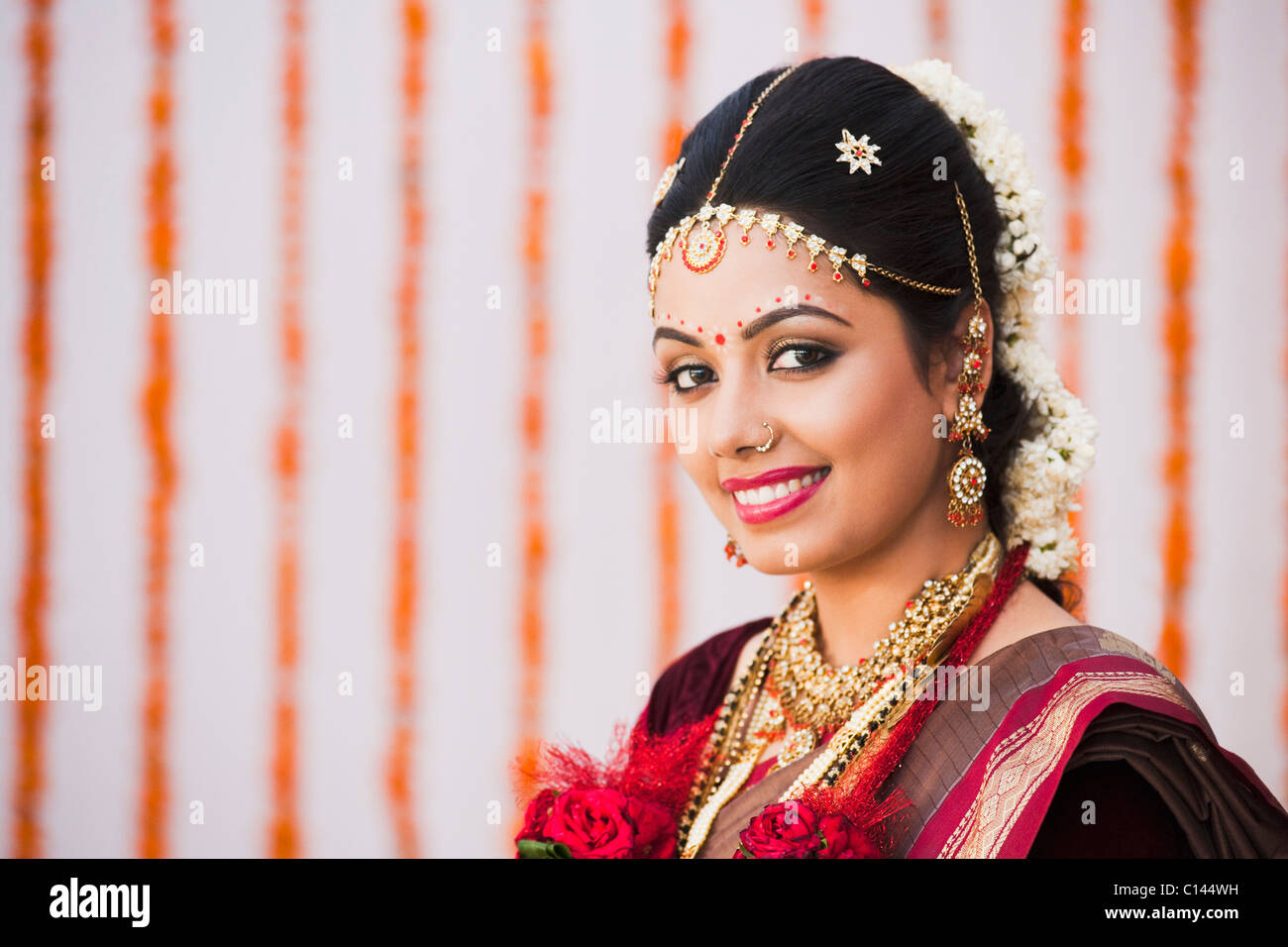 Portrait of a bride in traditional South Indian dress smiling Stock ...