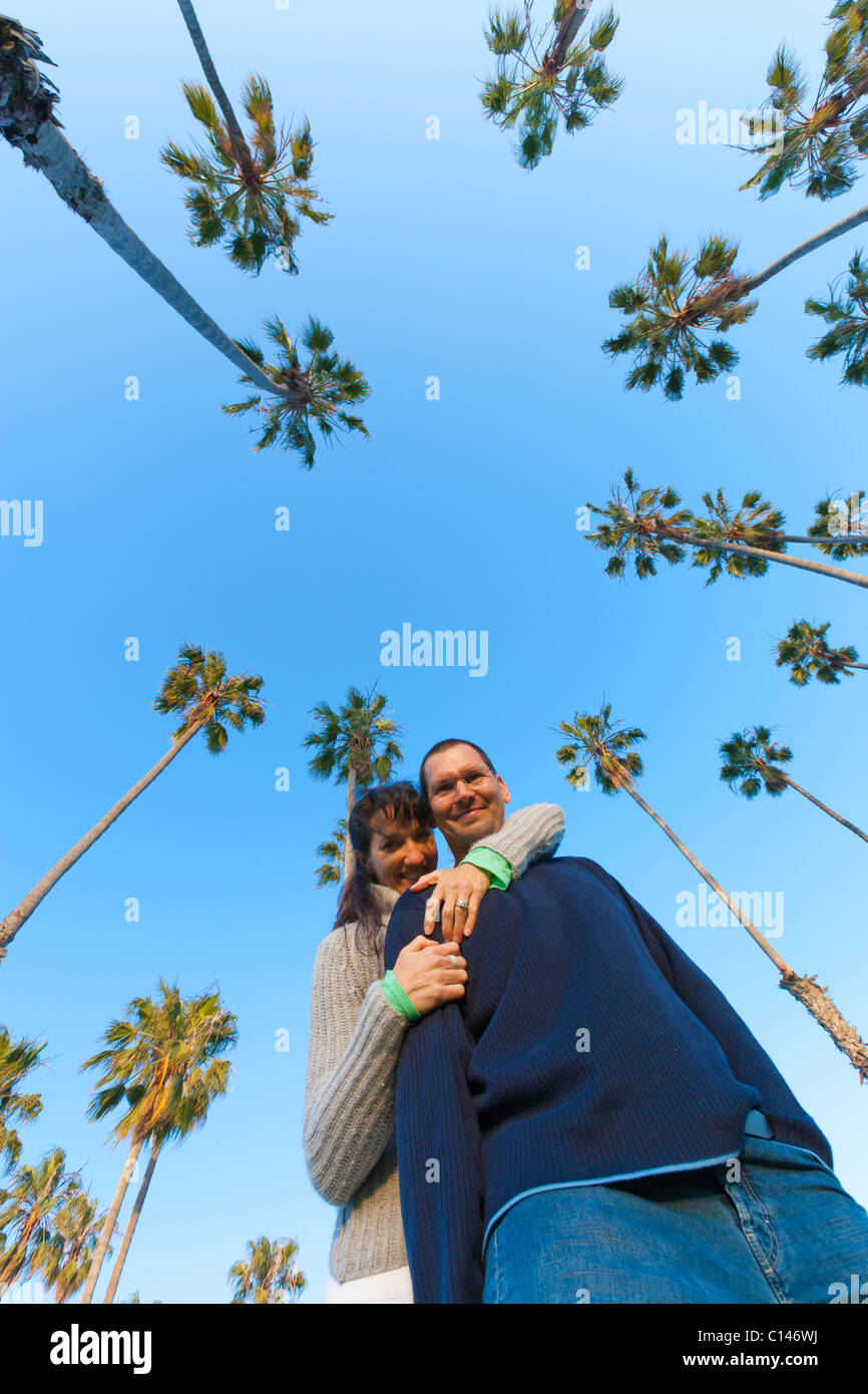 Hugging palm tree hi-res stock photography and images - Alamy