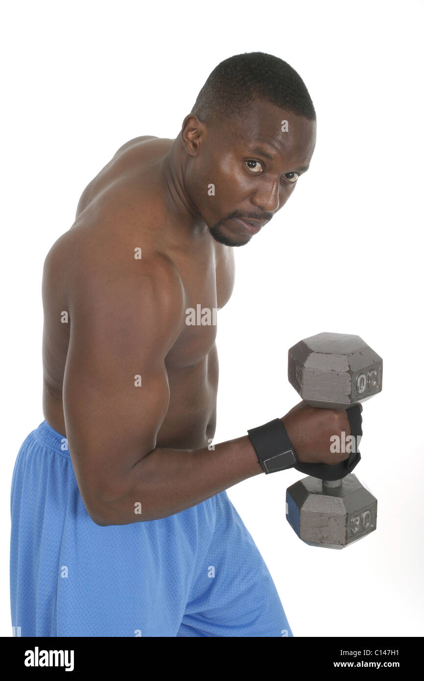 Handsome male with bulging muscles lifting weights Stock Photo - Alamy