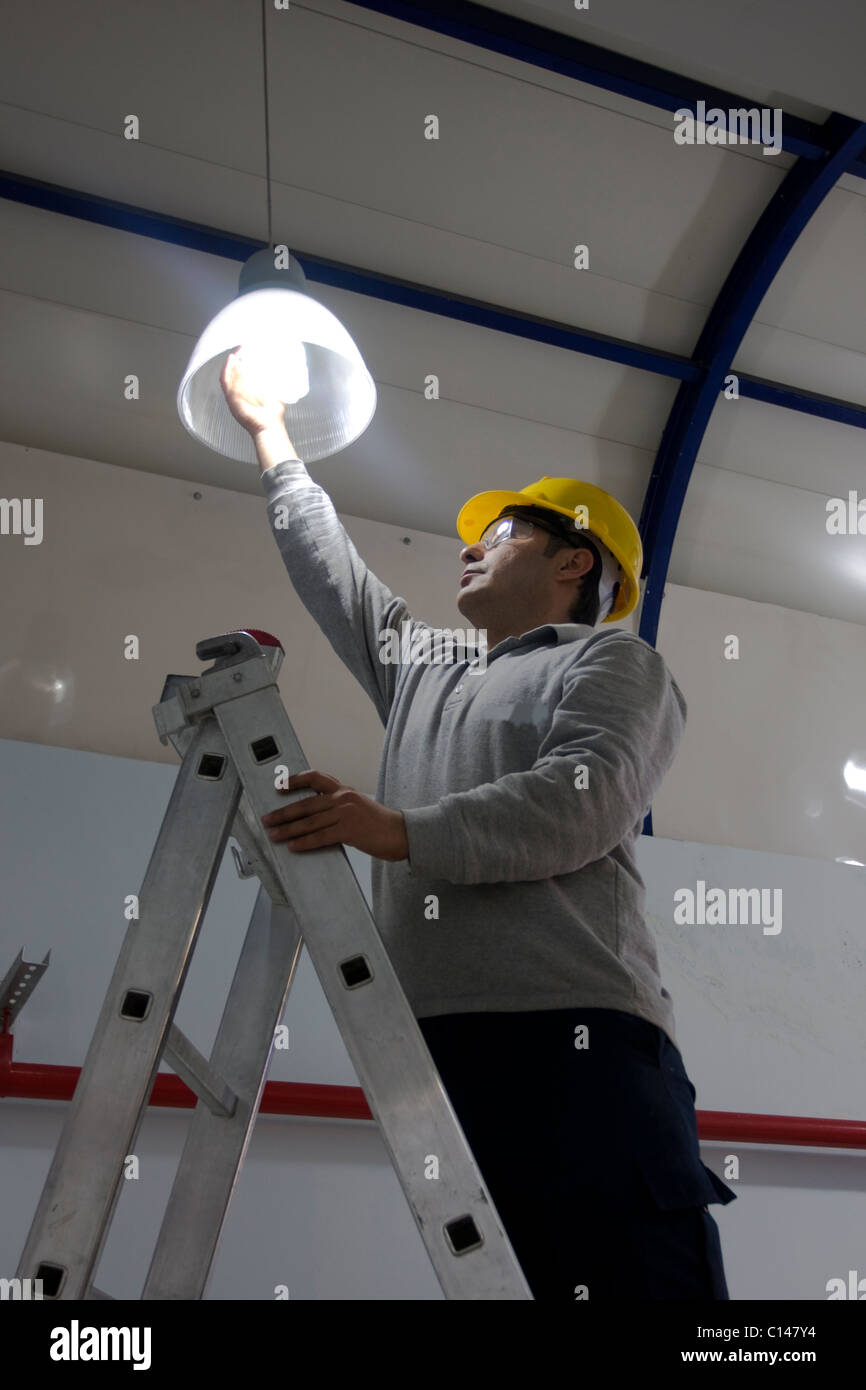 Technician is fixing the problem Stock Photo - Alamy