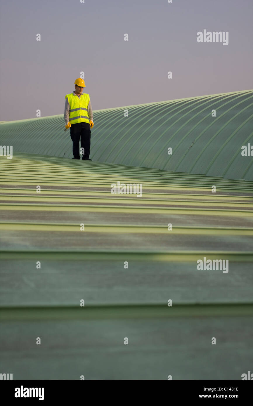 Worker fixing roof construction hi-res stock photography and images - Alamy