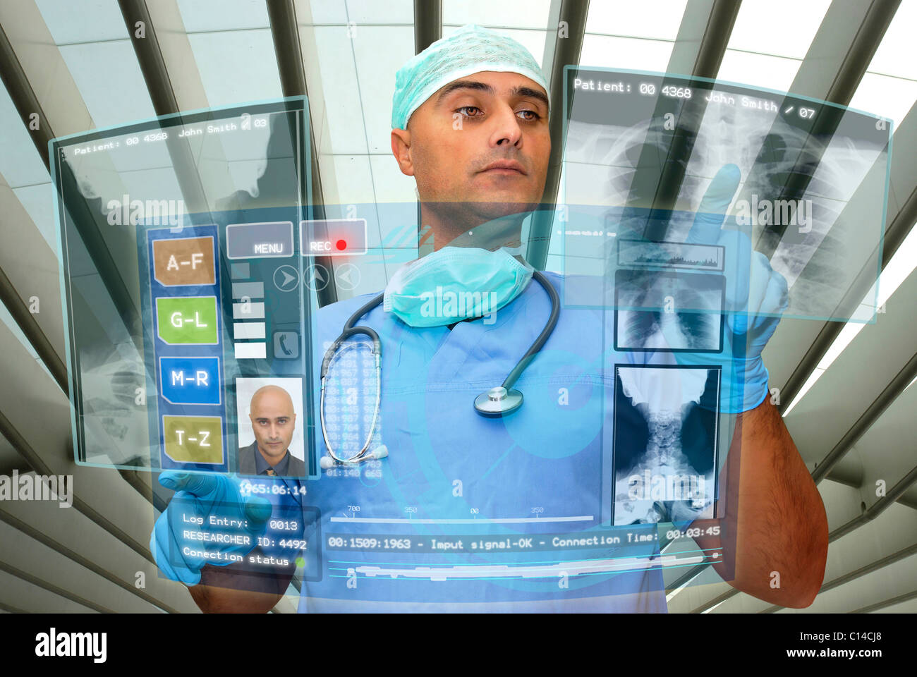 Doctor with high-tech computer screen viewing patient data Stock Photo ...