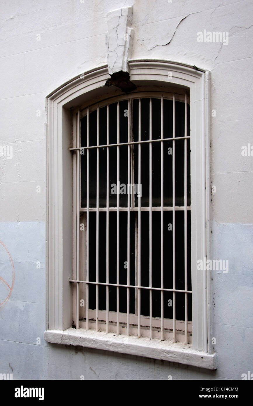 Sash window in Victorian Building broken glass with iron bars Stock ...