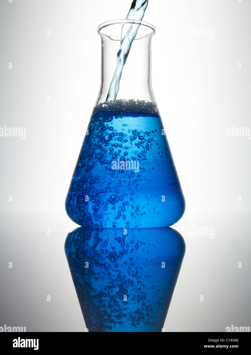 lab flask on a white background Stock Photo - Alamy