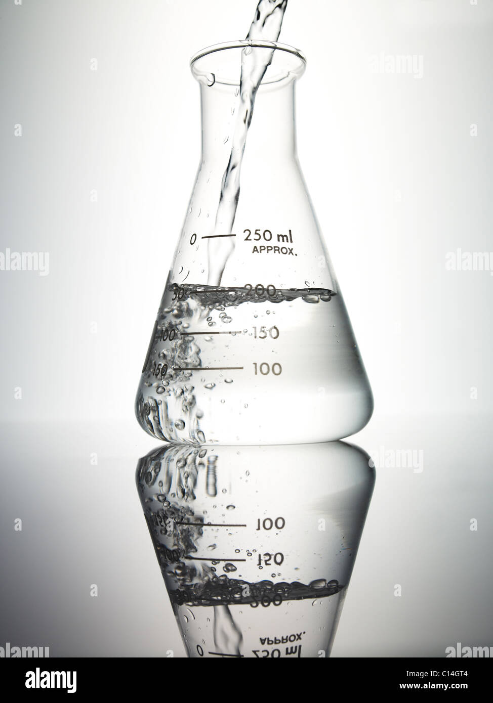 lab flask on a white background Stock Photo - Alamy