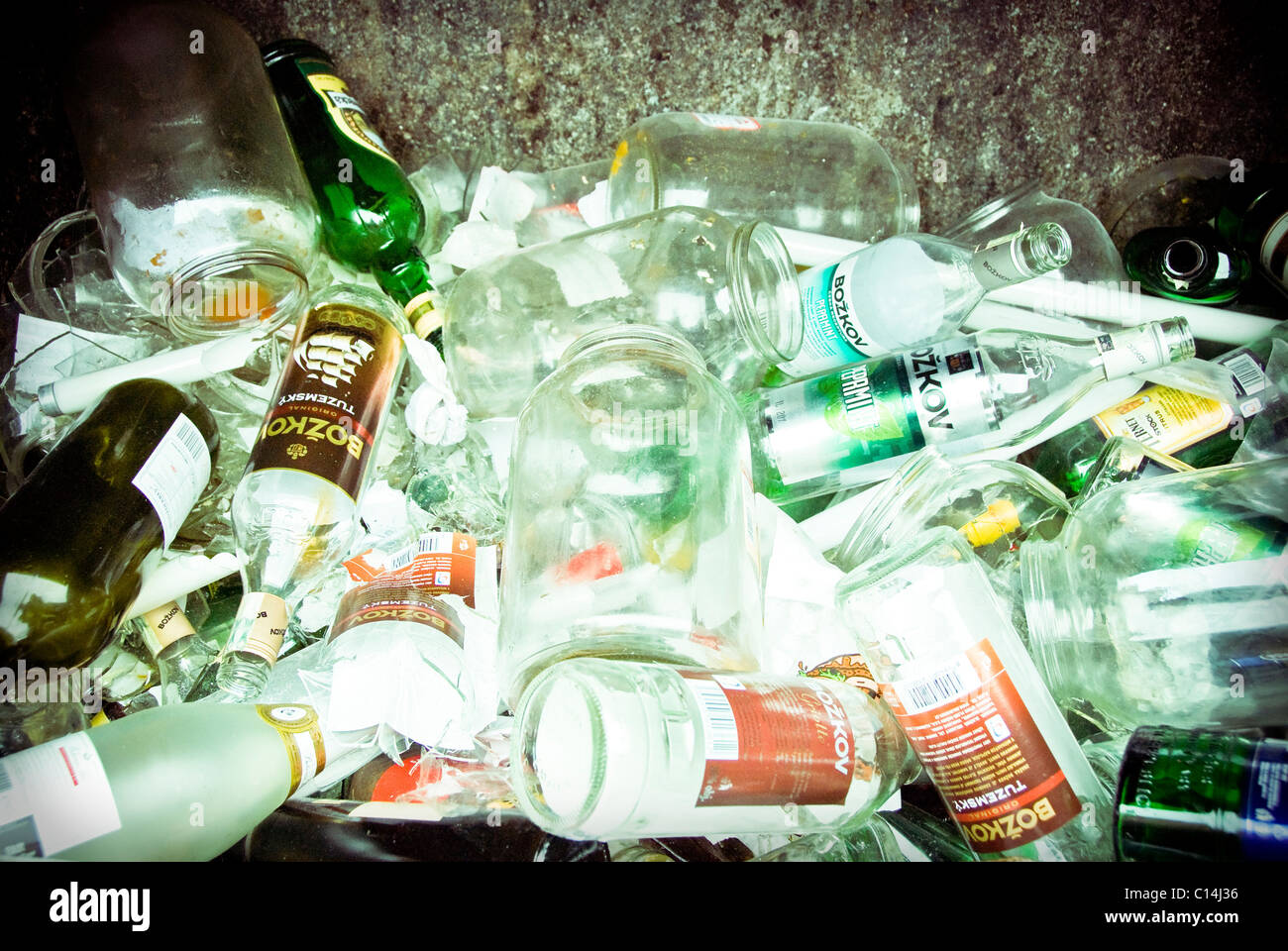 glass bottles in a recycling trash container Stock Photo - Alamy