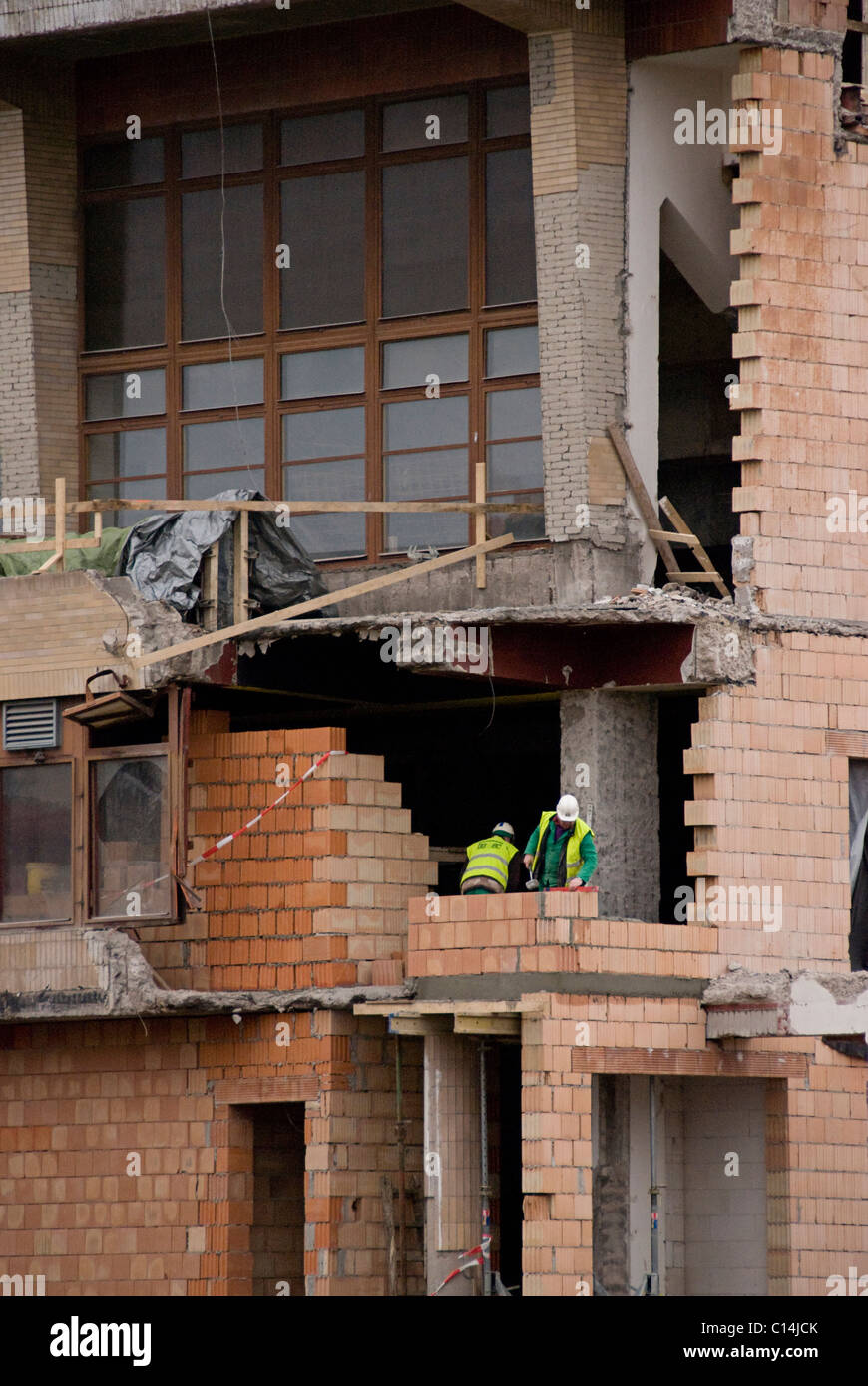 workers during the reconstruction of a building Stock Photo - Alamy