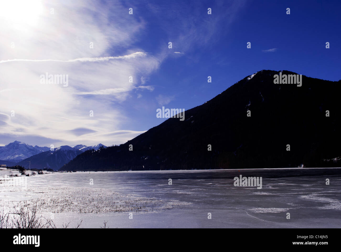 Alpine Lake with snow, ice and water Stock Photo - Alamy