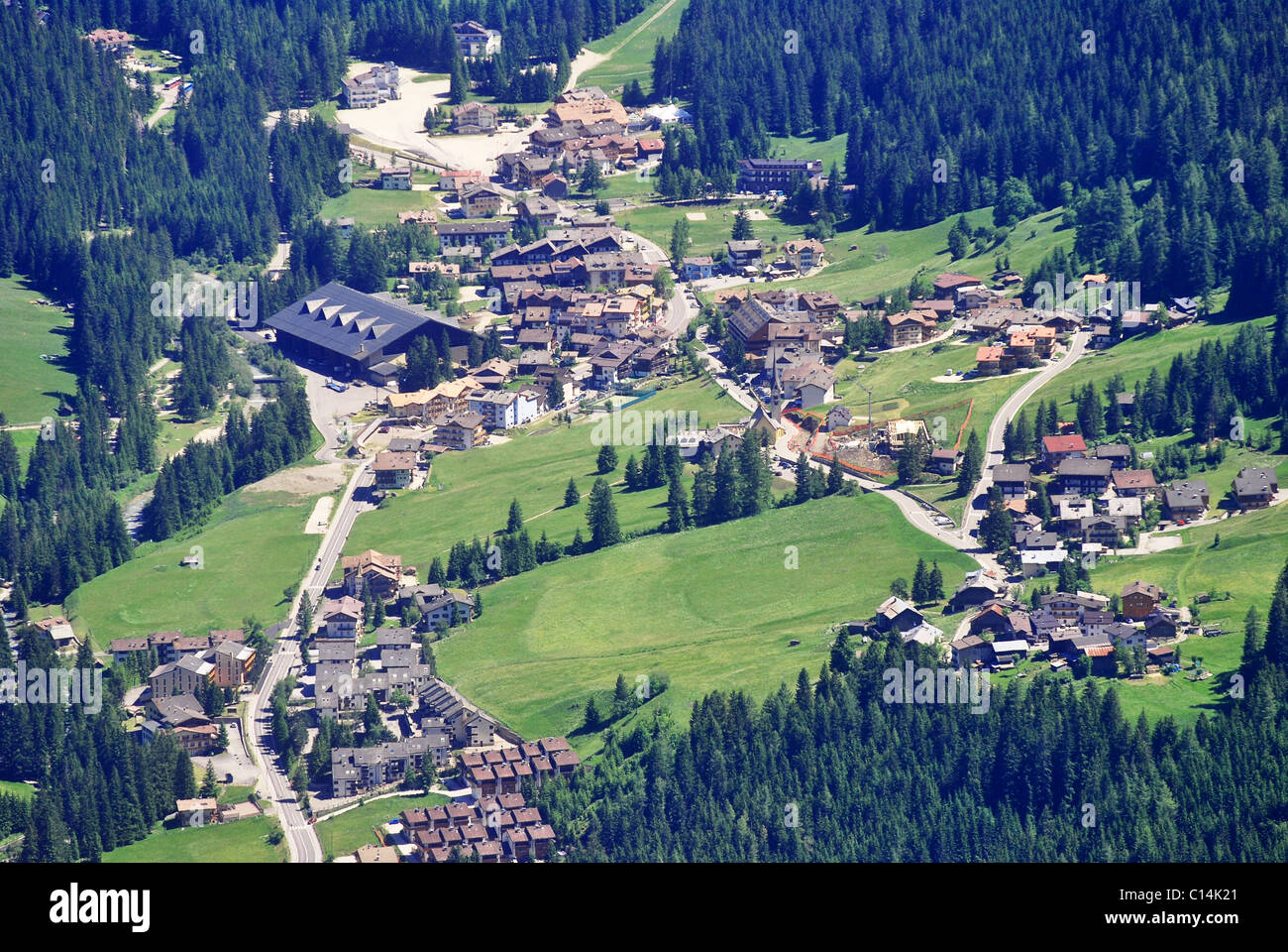 panorama of the Alpine valley of the Dolomites, with small town Stock ...