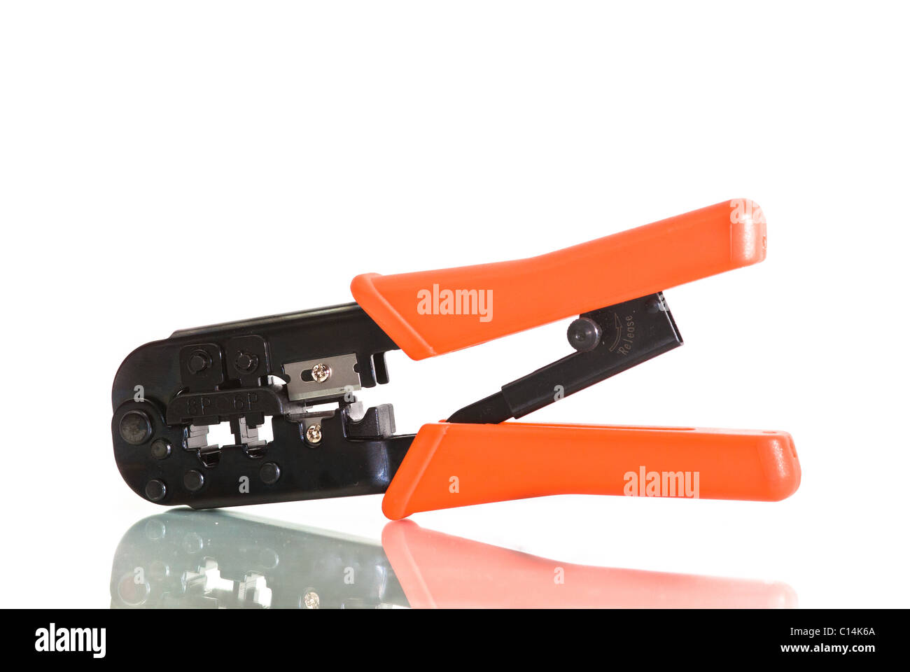 Network cable crimper isolated on white background Stock Photo - Alamy