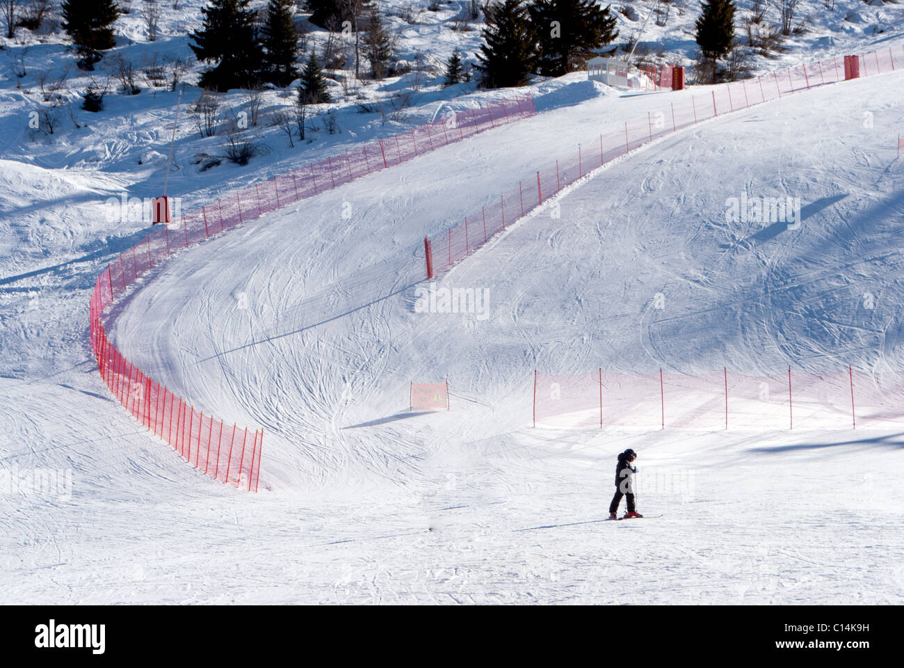skiers on ski slope with a snowboard Stock Photo - Alamy