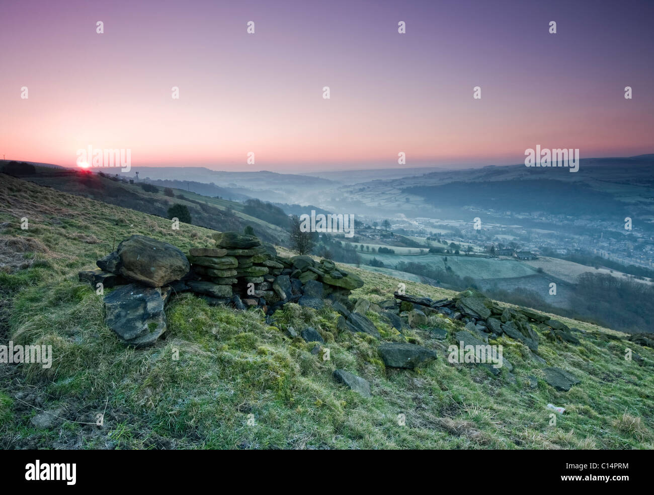 Sunrise over misty valley Stock Photo - Alamy