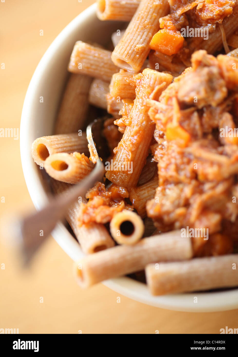 Rigatoni pasta with pork ragu Stock Photo - Alamy