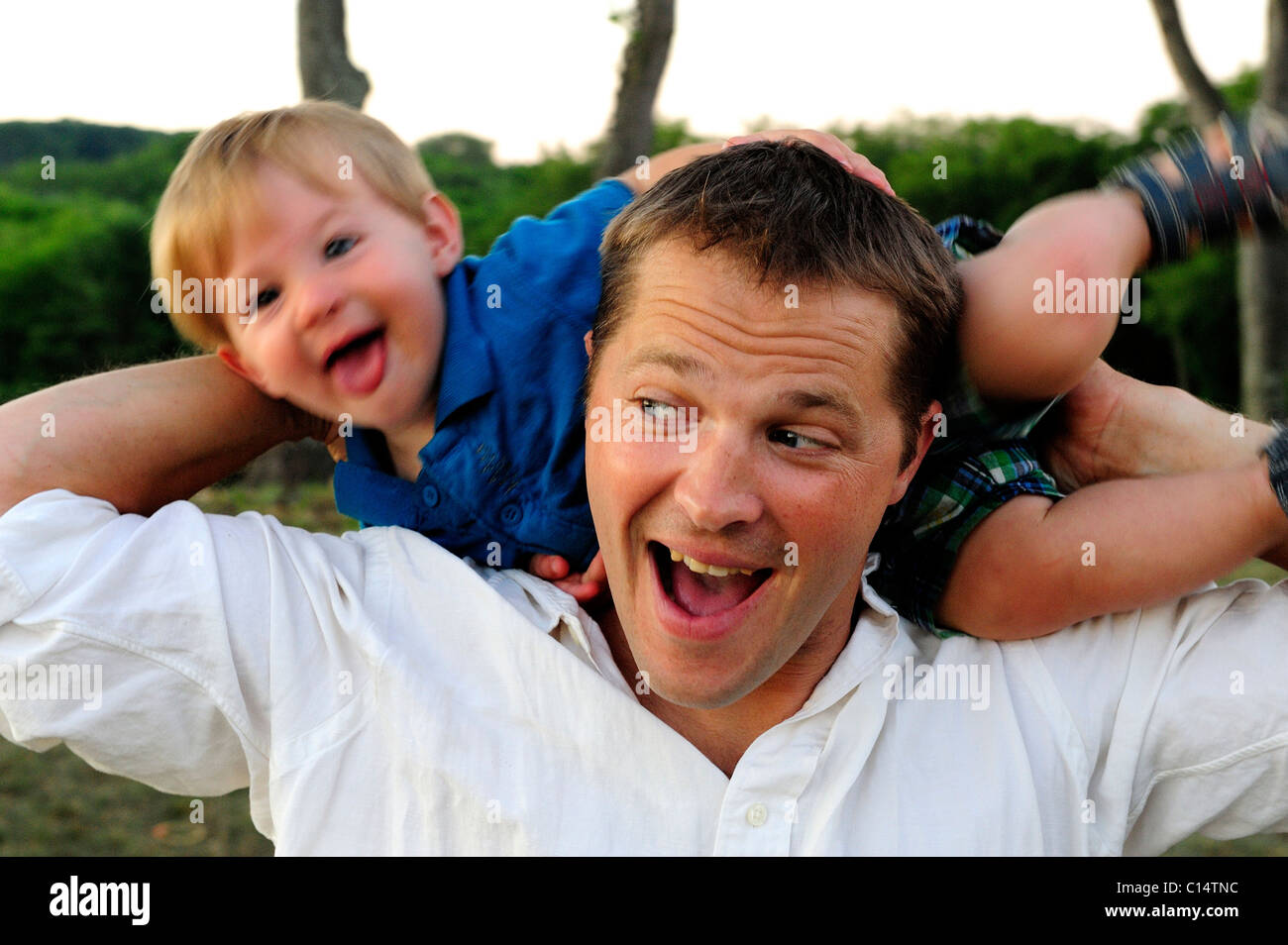 Father and son play Stock Photo - Alamy