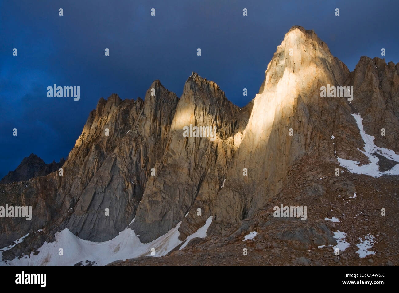 A storm produces dramatic light on Mount Whitney and the Keeler Needle ...