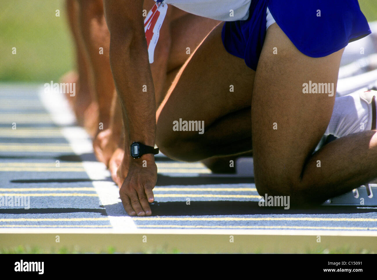 Detail of start of men's 100 meter sprint race Stock Photo - Alamy