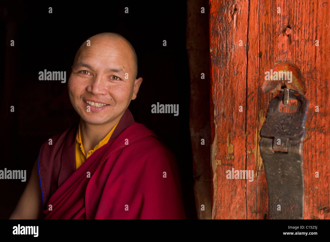 Happy monk smiling monk hi-res stock photography and images - Alamy