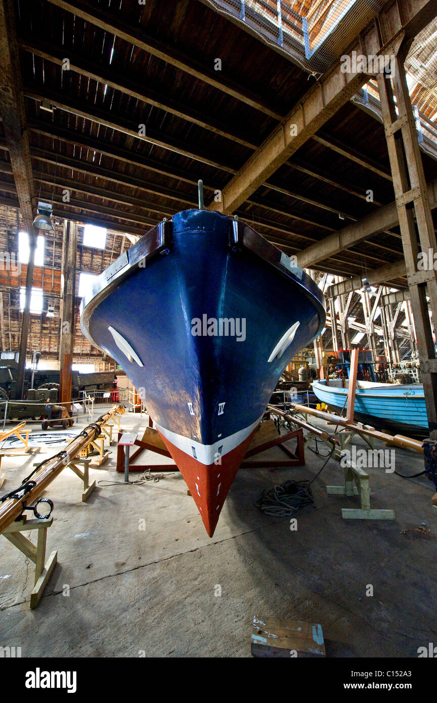 The prow of a historic lifeboat undergoing restoration at the Chatham ...