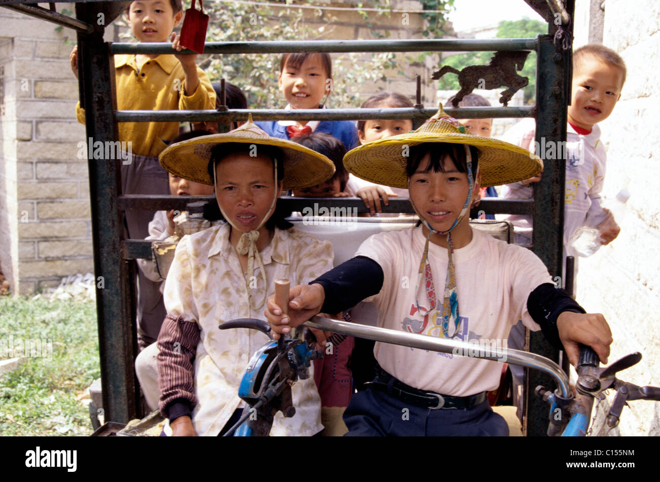 Huian, China. chinese Family ride in new tractor purchased by the ...