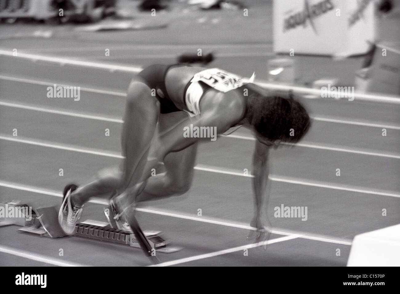 Female athletes in starting blocks hi-res stock photography and images ...