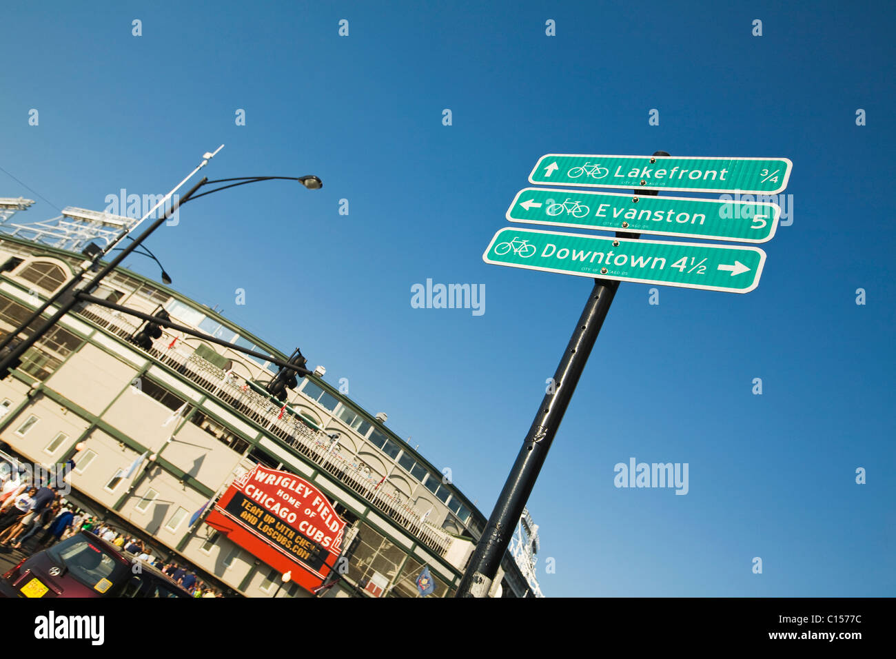 Sign of bike trail, Wrigley Field stadium in background Stock Photo - Alamy